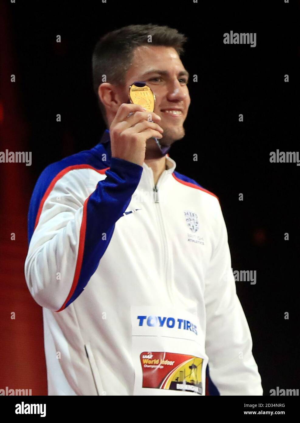 Great Britain's Andrew Pozzi poses with his gold medal after winning ...