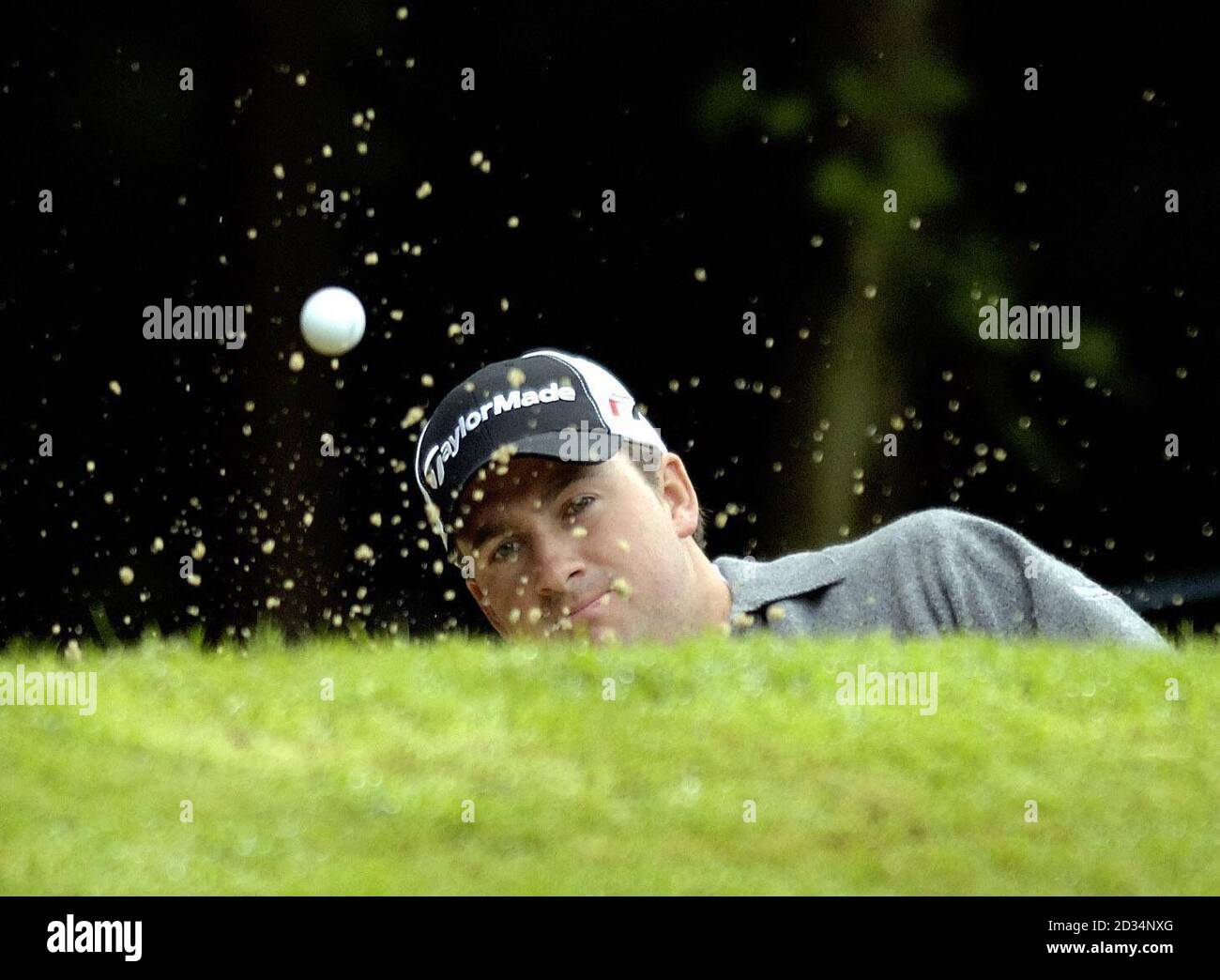Plays out bunker on 1st hole hi-res stock photography and images - Alamy
