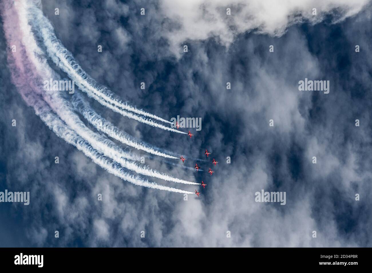 images of fighter planes doing air stunts during an aviation airshow ...