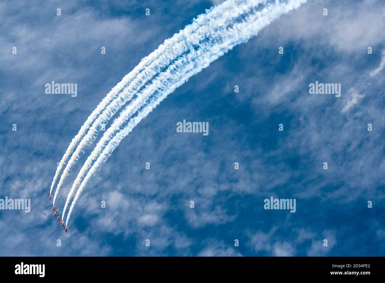 images of fighter planes doing air stunts during an aviation airshow ...