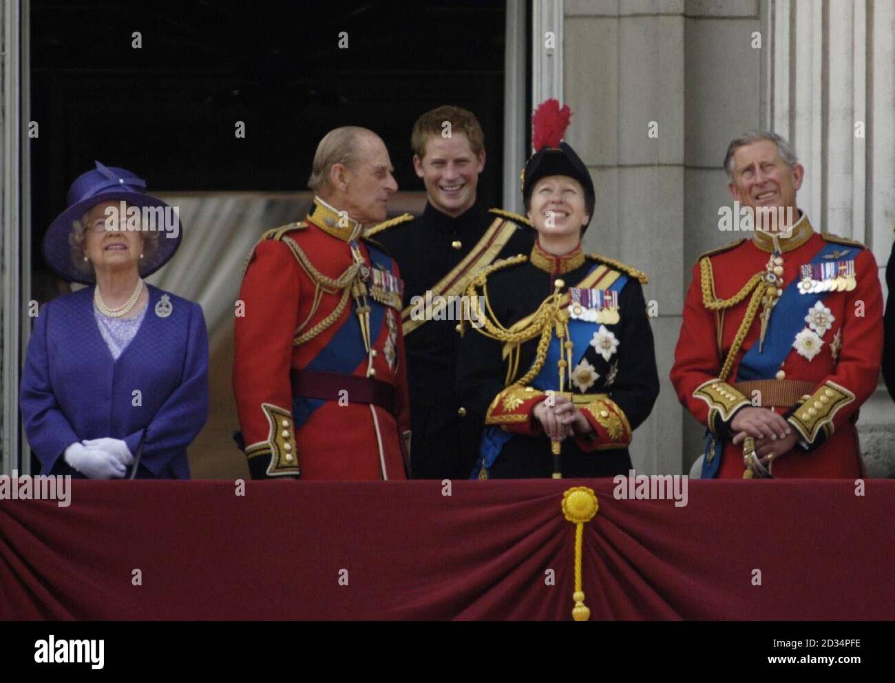 Members of the Royal Family watch a flypast from a Buckingham Palace ...