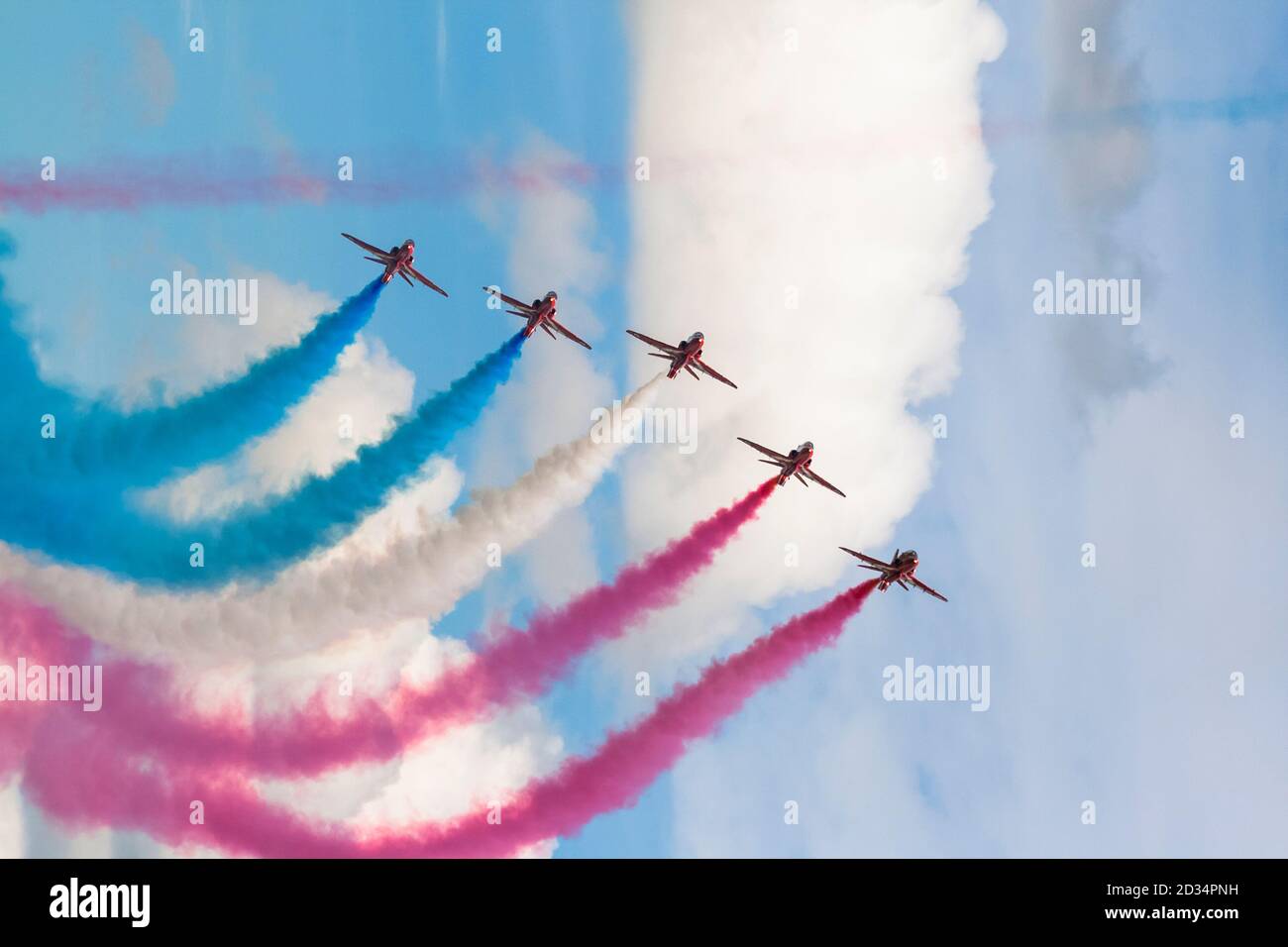 images of fighter planes doing air stunts during an aviation airshow ...