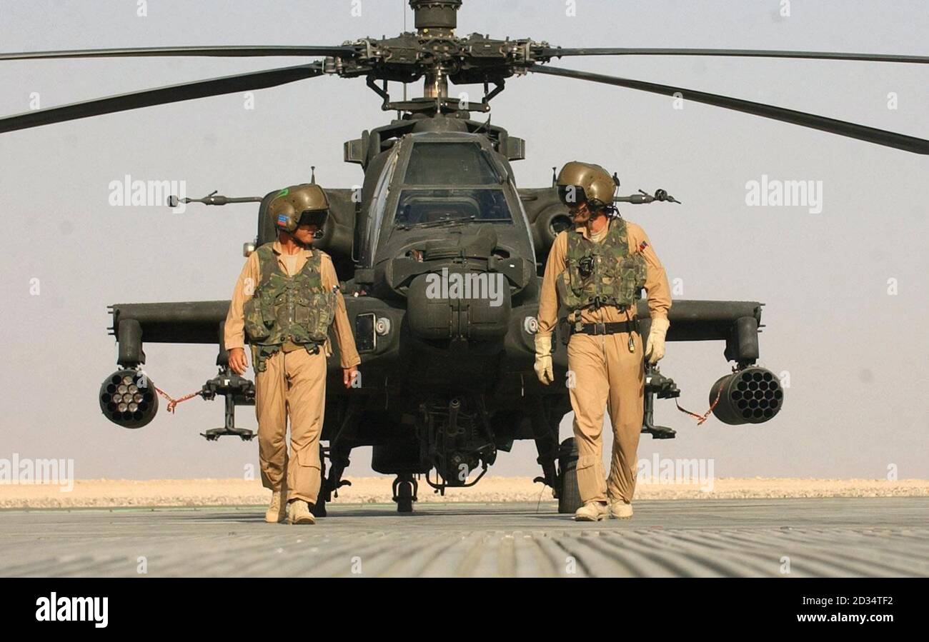 Pilots with an Apache helicopter at Camp Bastion in Afghanistan Stock ...