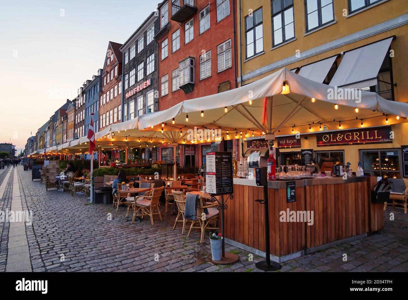 Copenhagen, Europe, Nyhavn promenade with restaurants and houses Stock ...