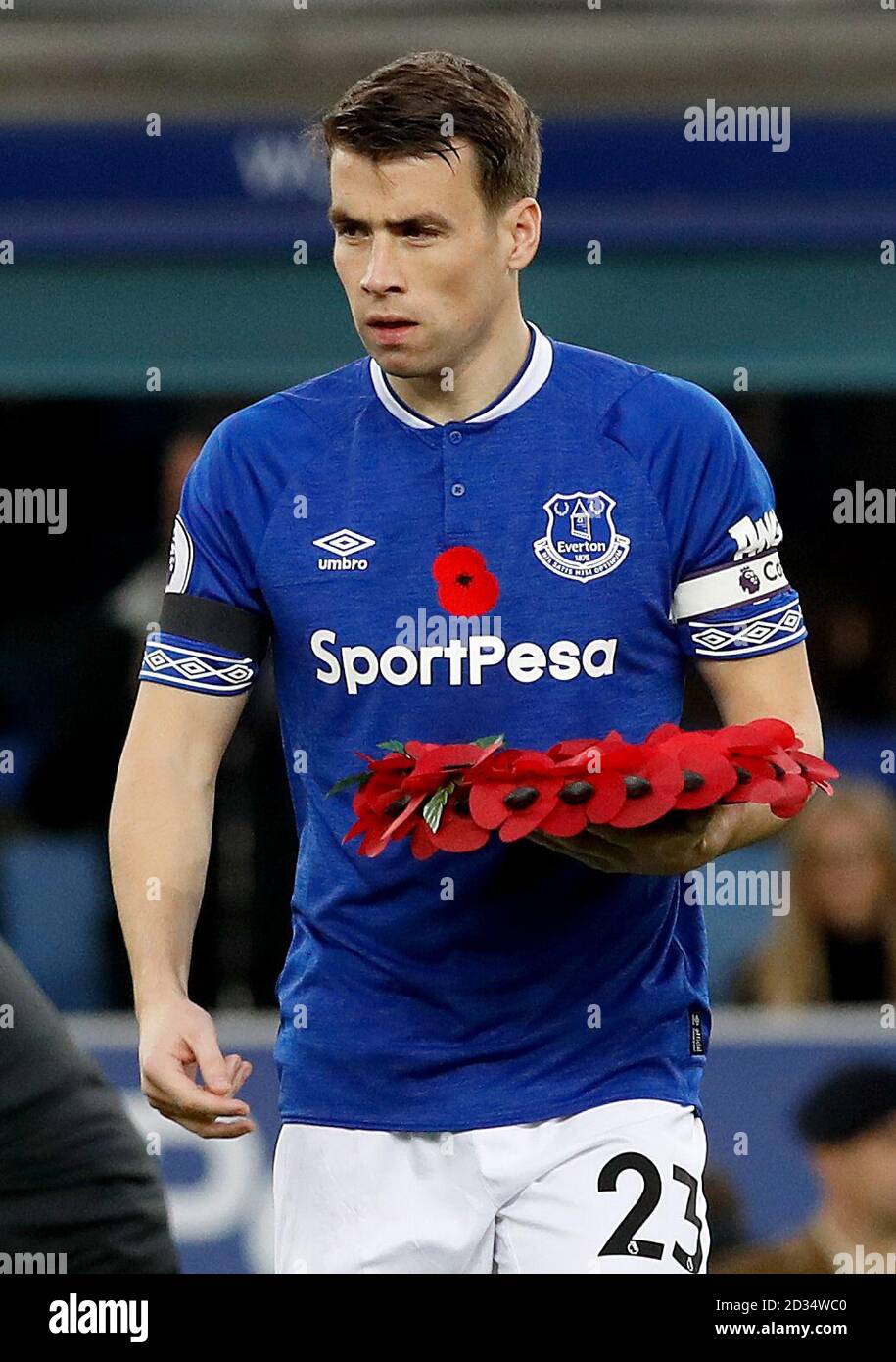 Everton's Seamus Coleman lays a wreath of poppys in remembrance of ...