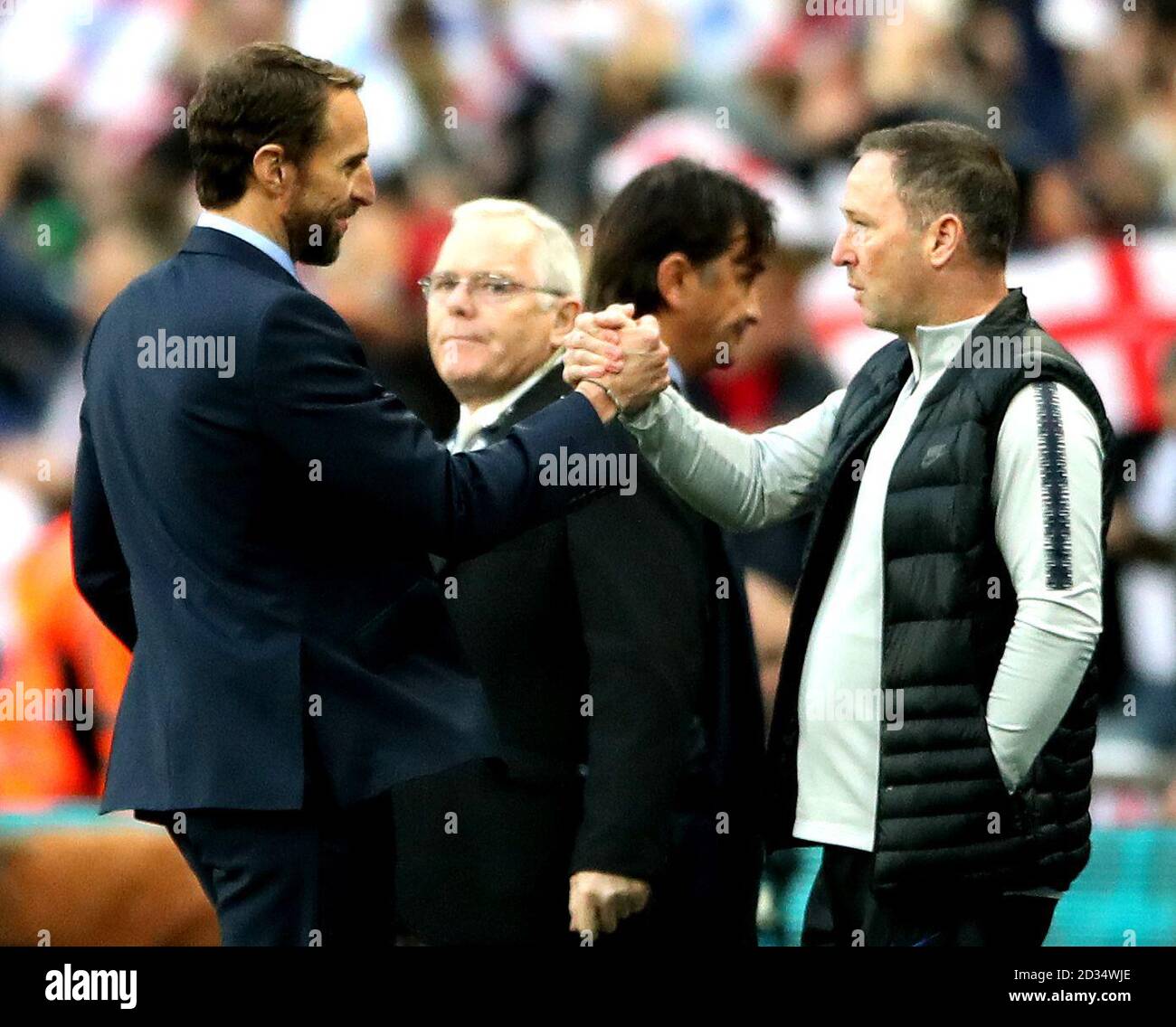 England manager Gareth Southgate (left) and assistant Steve Holland ...