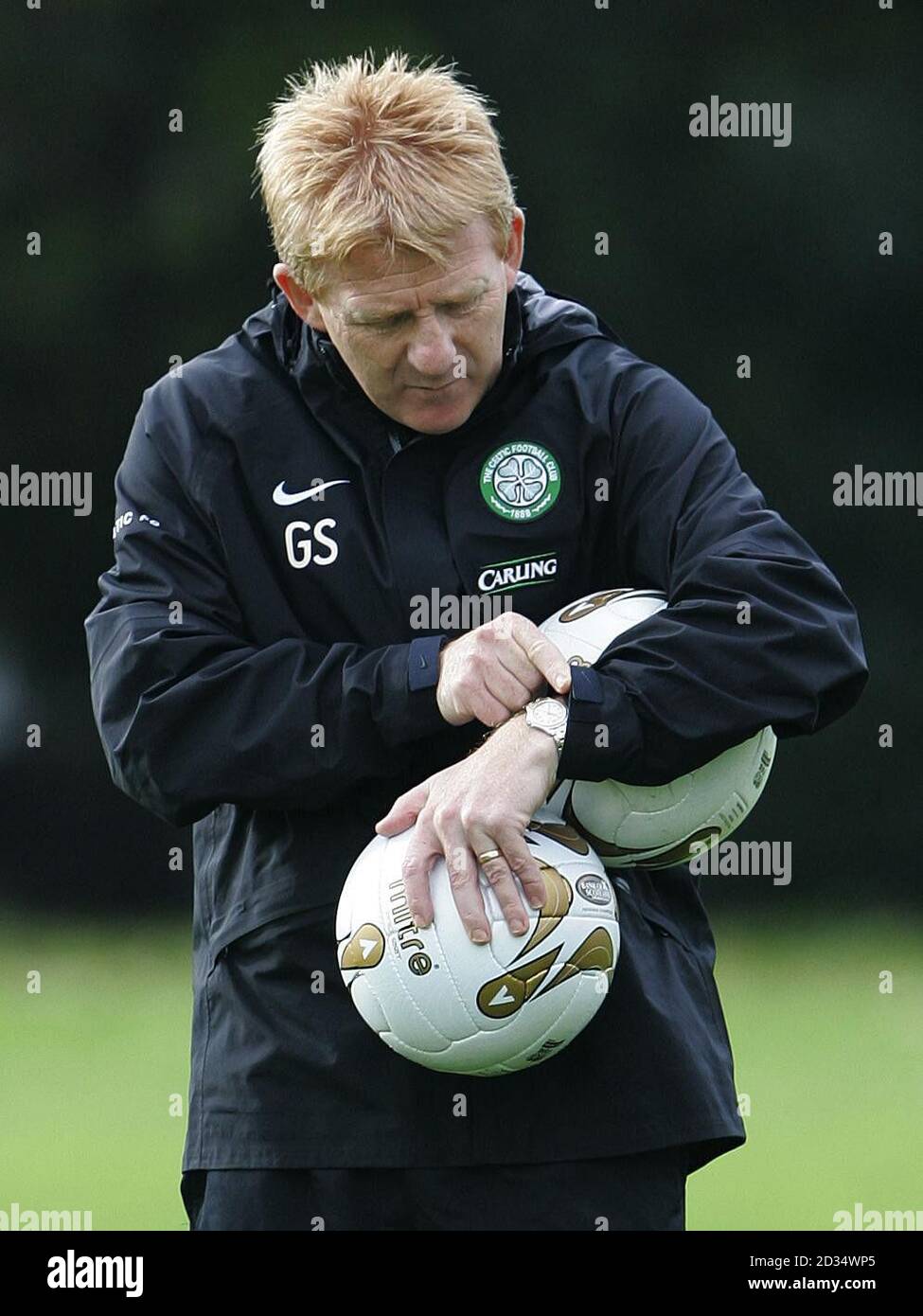 Celtic Manager Gordon Strachan, checks his watch during a training at ...