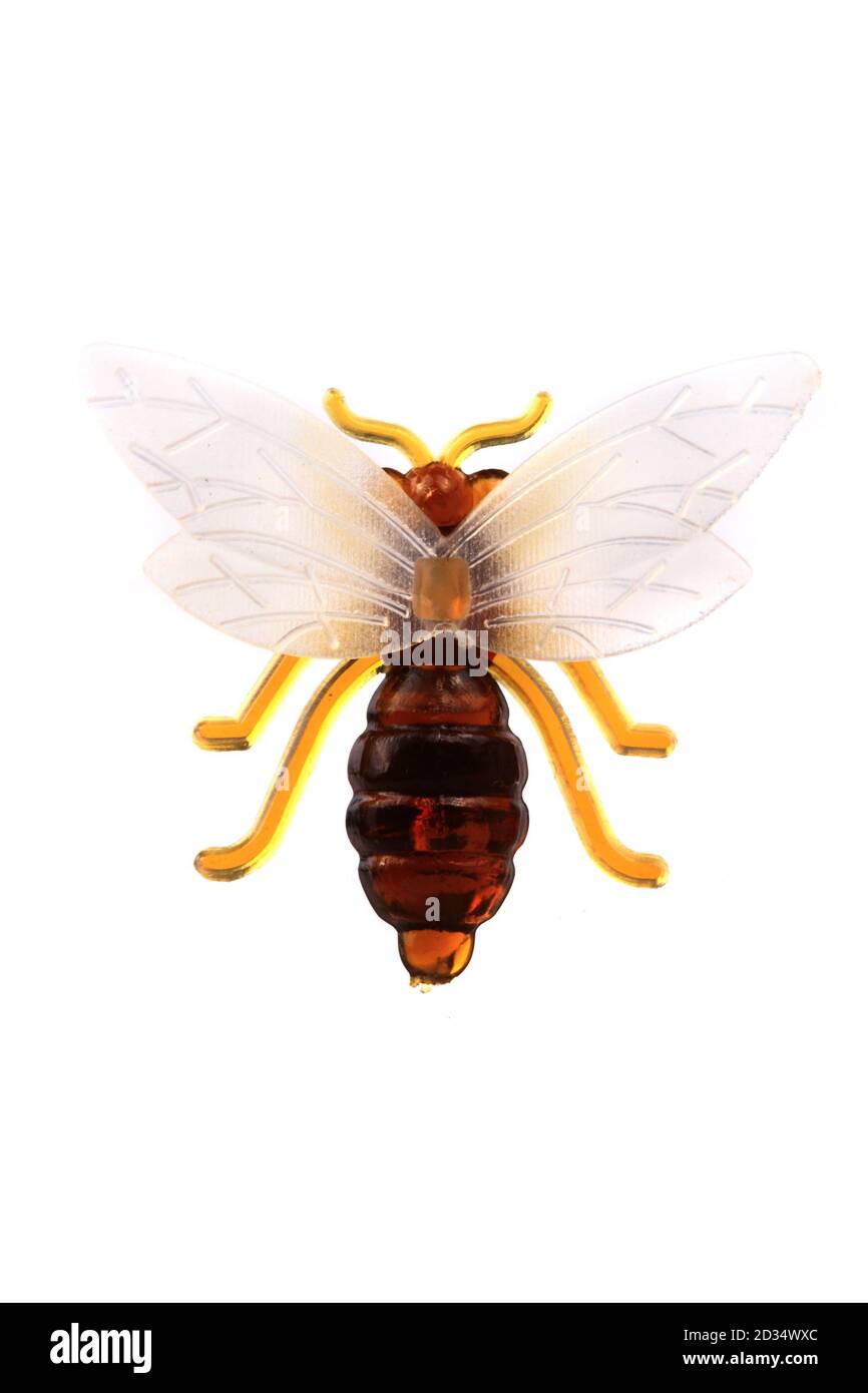 small plastic bee isolated on the white background Stock Photo - Alamy