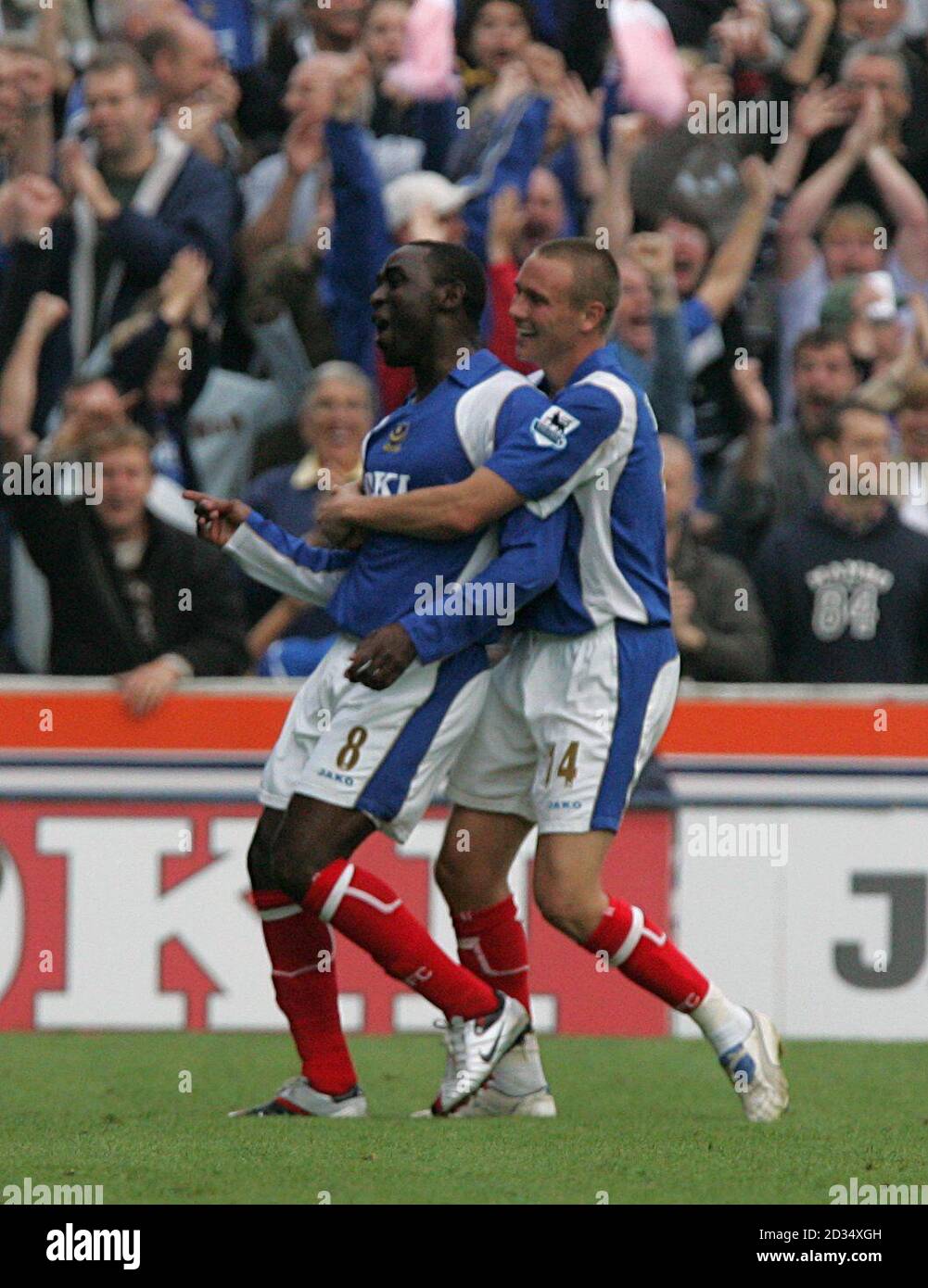 Andrew Cole celebrates scoring for Portsmouth Stock Photo - Alamy