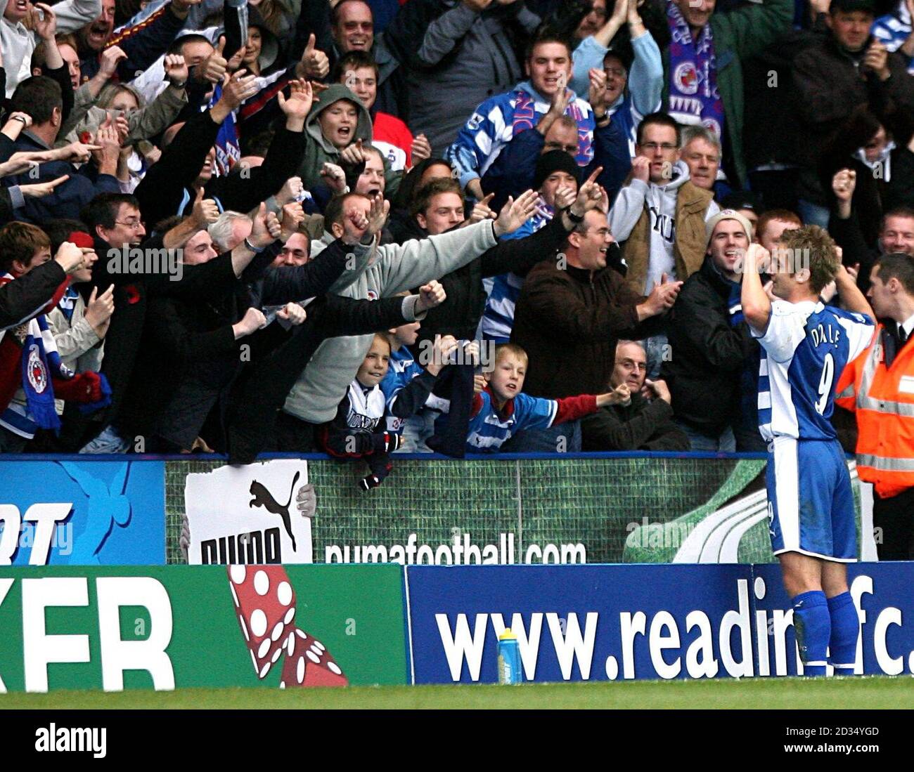Reading's Kevin Doyle celebrates his goal in front of the Reading fans ...