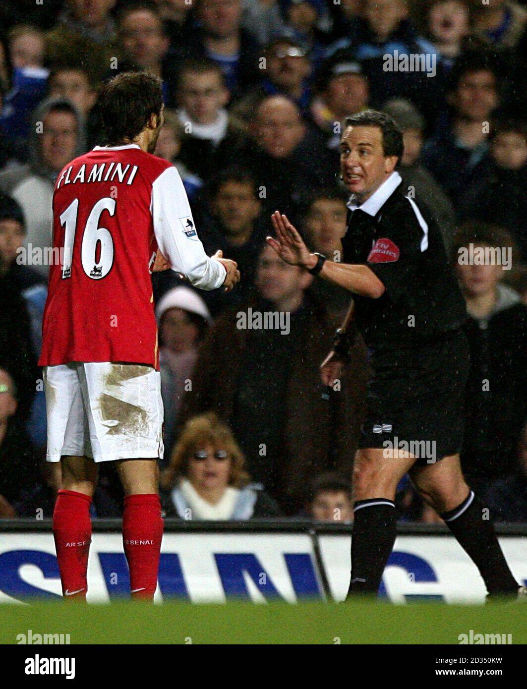 Referee Alan Wiley has words with Arsenal's Mathieu Flamini Stock Photo ...