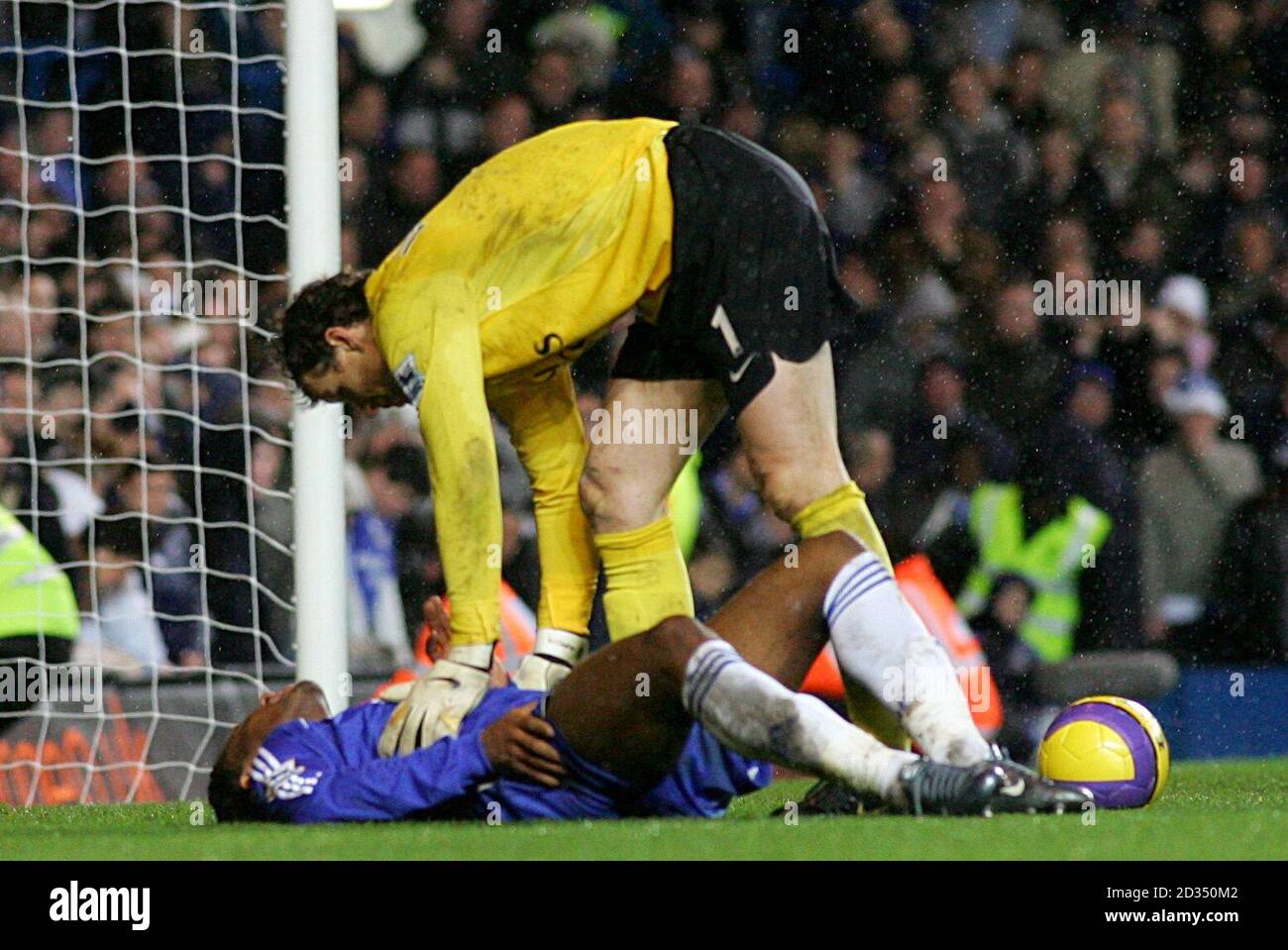 Arsenal goalkeeper Jens Lehmann checks on Chelsea's Didier Drogba Stock ...