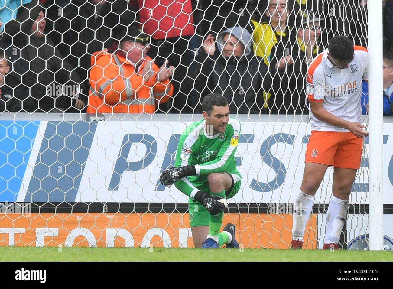 Luton Town's James Shea reacts as Burton Albion's Lucas Akins ...
