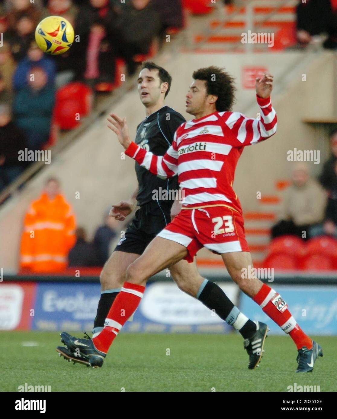 Full length tackling running mangrs hi-res stock photography and images ...