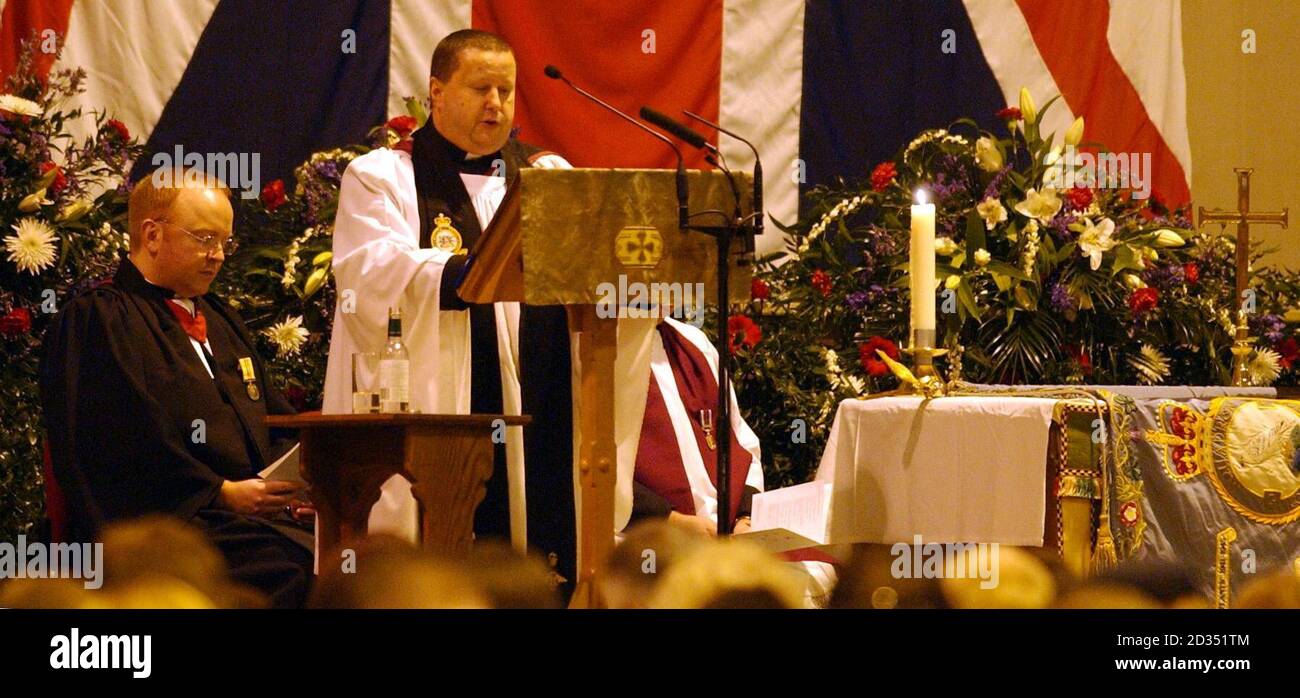 Father Ivan Boyle during a memorial service for 14 British airmen who ...