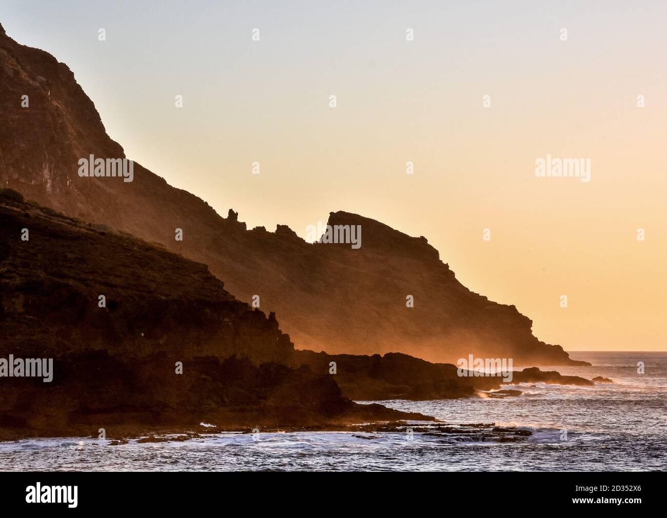 The Sun Setting in the Sea Stock Photo - Alamy