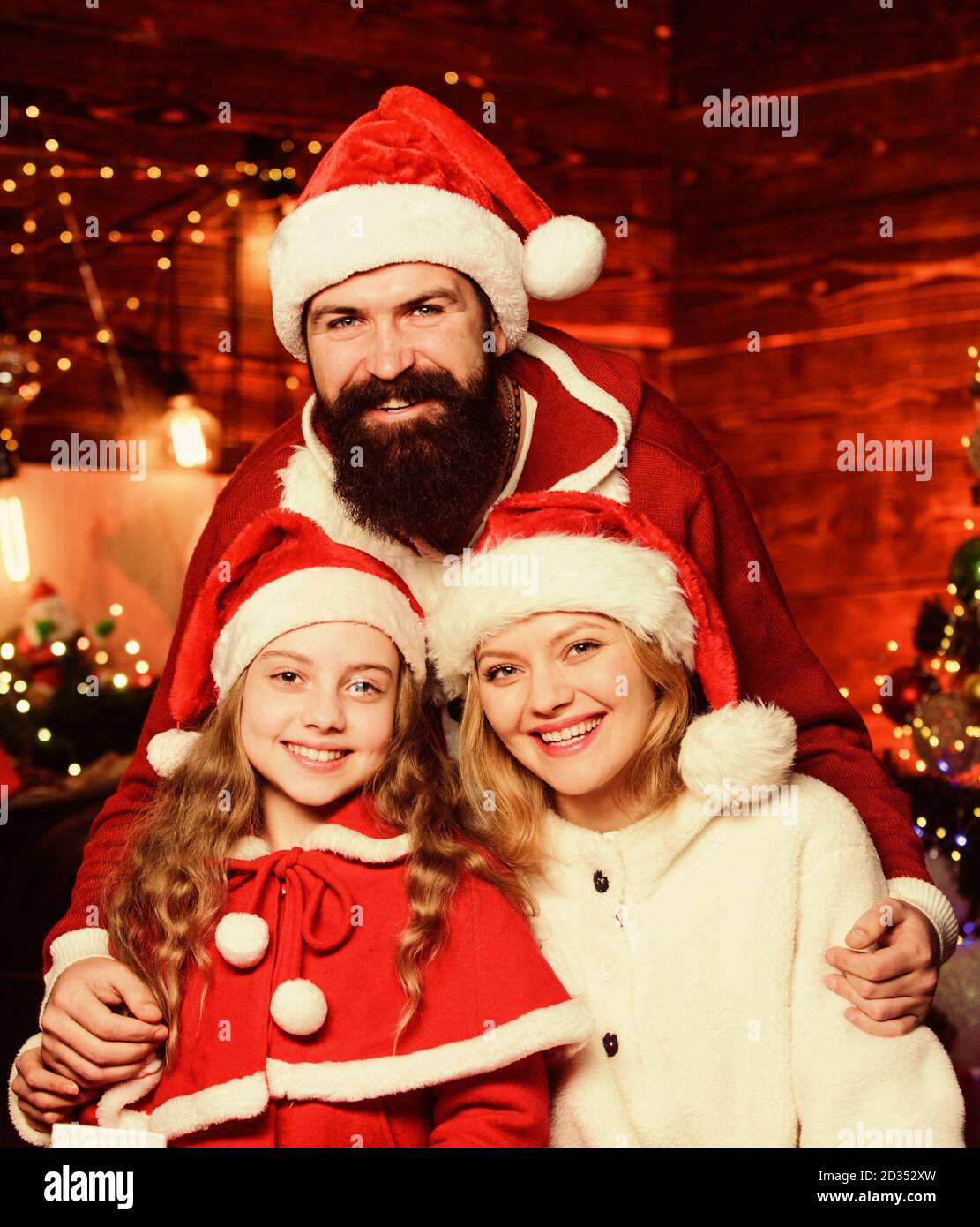 Being best Santa for them. Father Santa claus costume with family ...