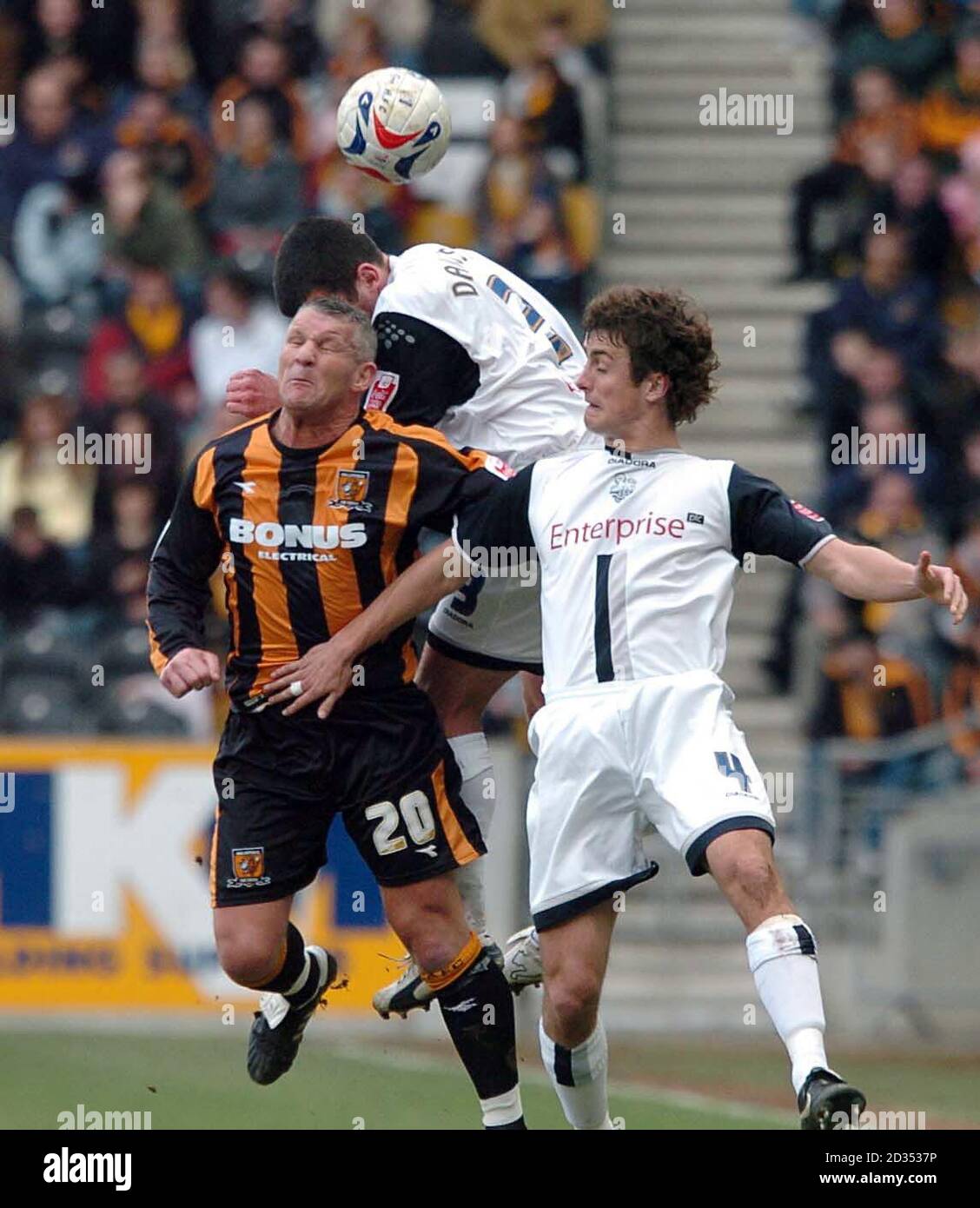 Hull's Dean Windass (left) clashes with Preston's Callum Davidson ...