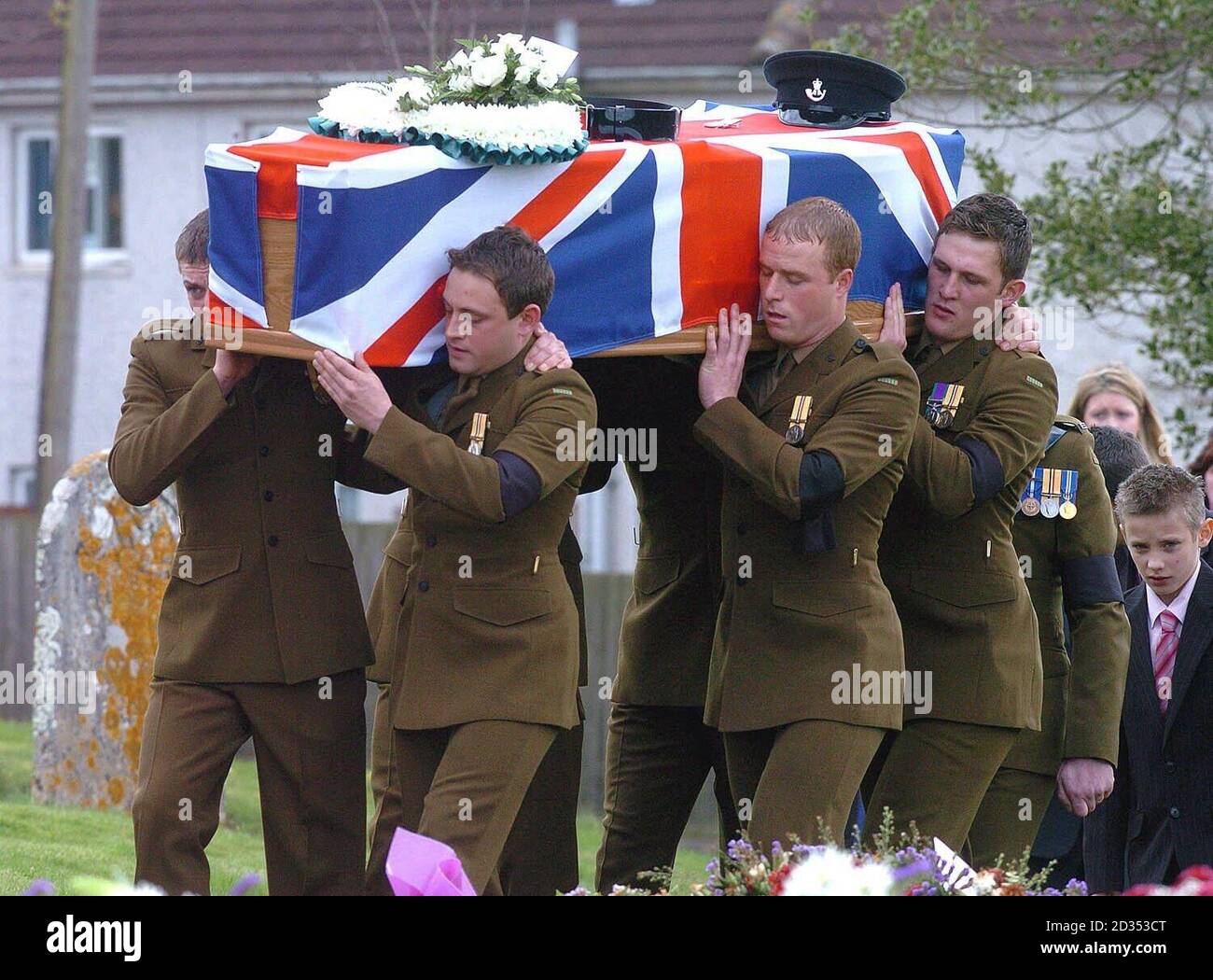 The coffin of Rifleman Daniel Coffey arrives for his funeral at St ...