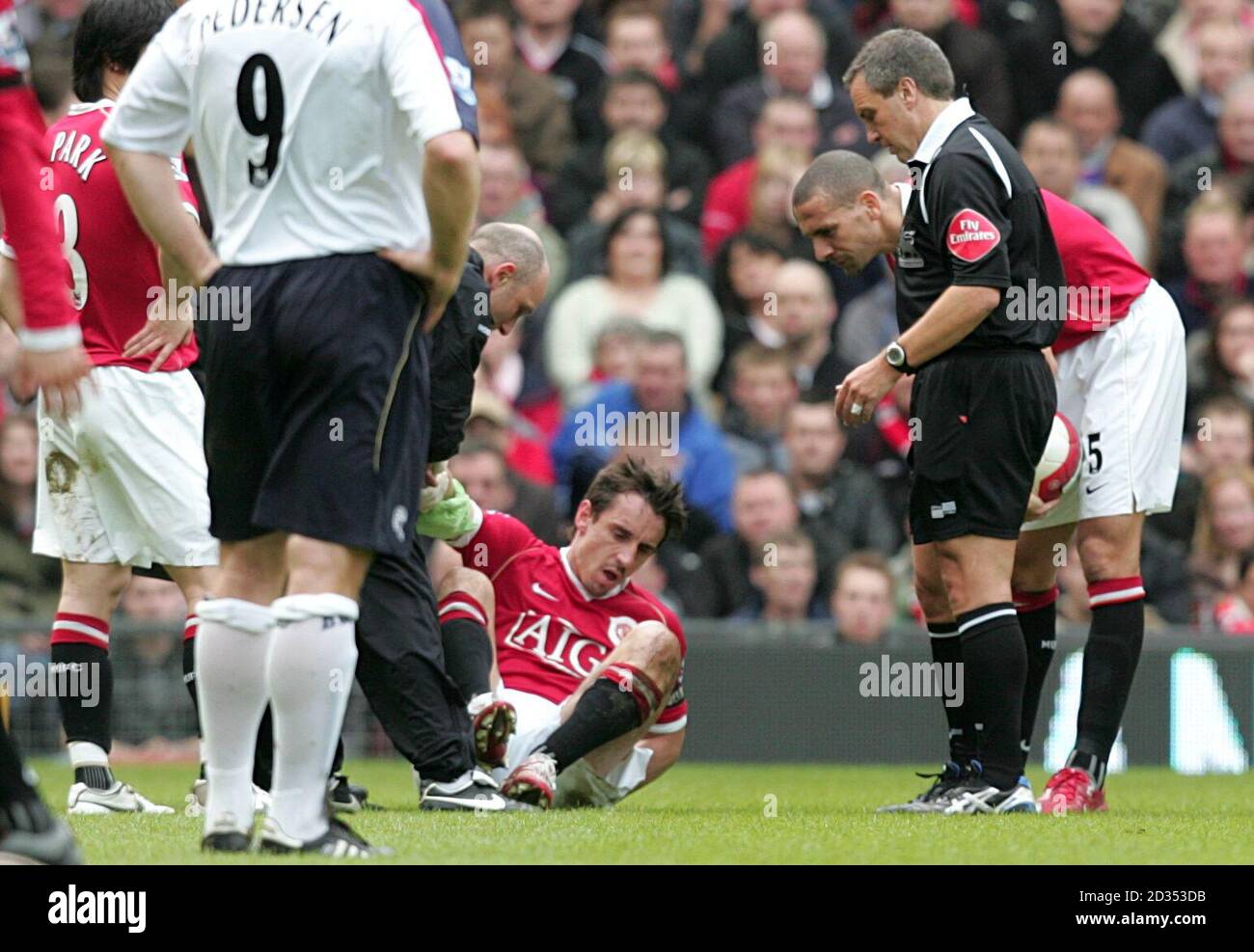 Manchester United's Gary Neville receives treatment for an injury Stock ...