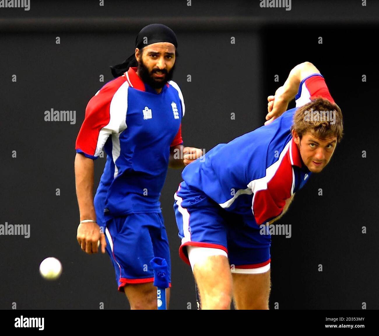 England cricketers Monty Panesar (left) and Liam Plunkett in action ...