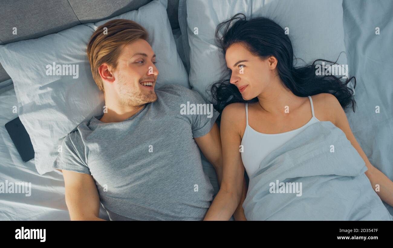 Top View Bed at Morning: Happy Attractive Young Couple Wake up Together ...