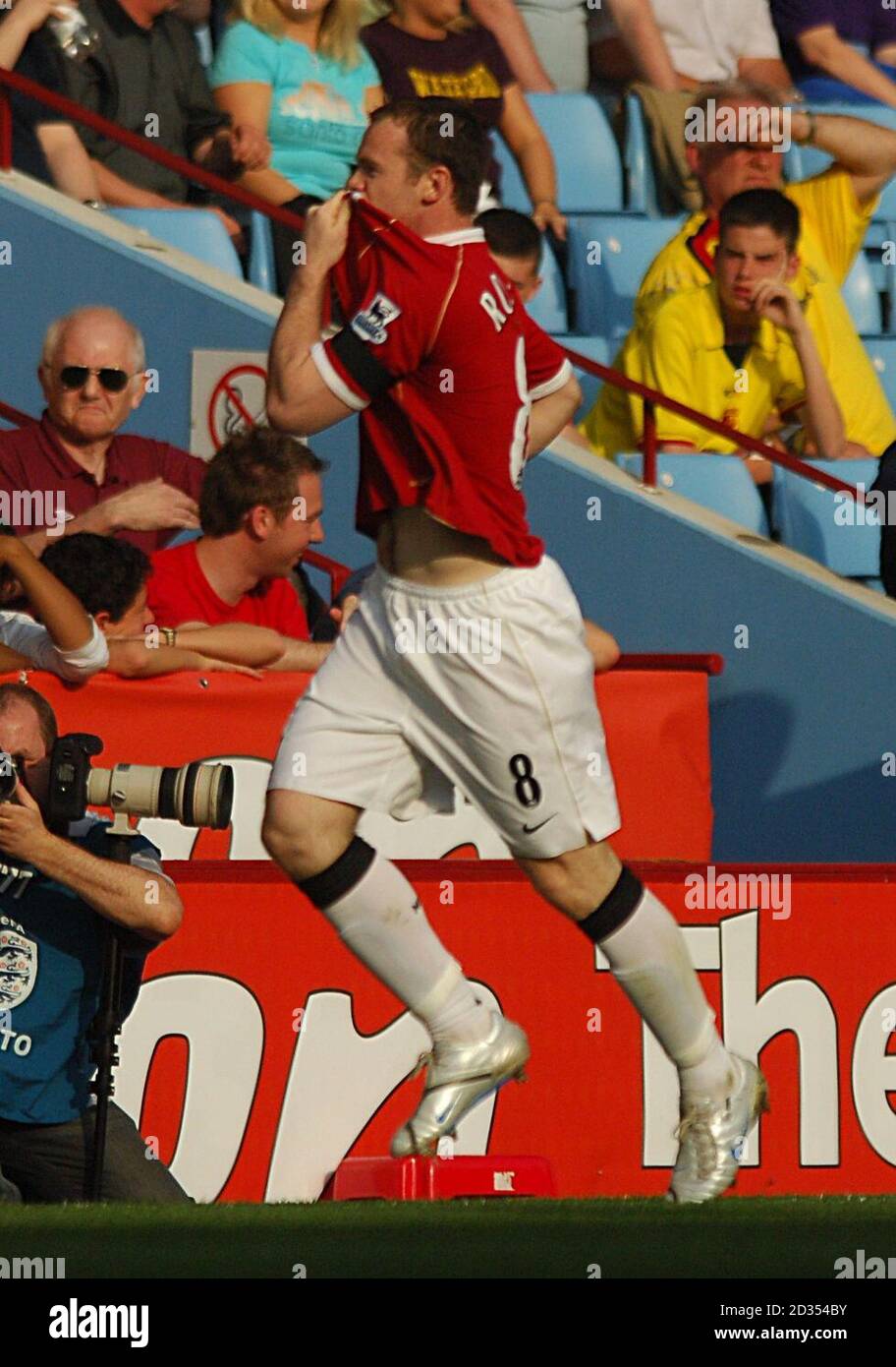 Manchester United's Wayne Rooney celebartes scoring the first goal of ...
