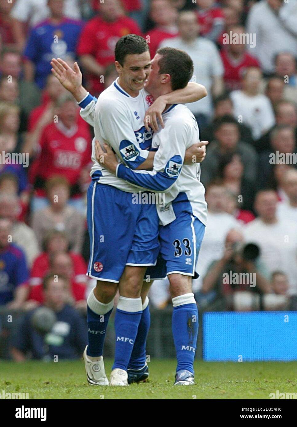 Middlesbrough's Mark Viduka celebrates his goal with Stewart Downing ...