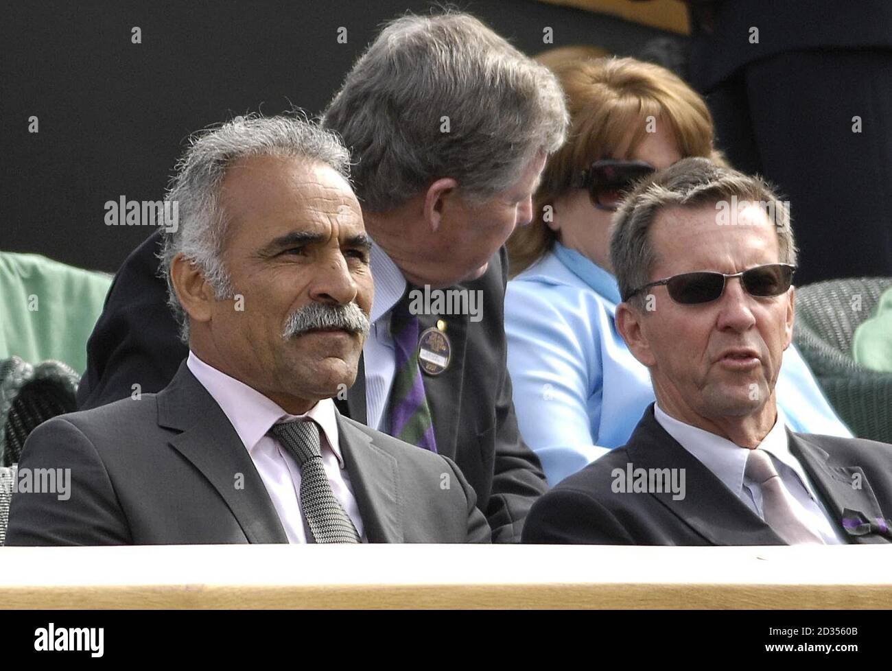 Iran's Mansour Bahrami (left) watches the Ladies singles match between ...
