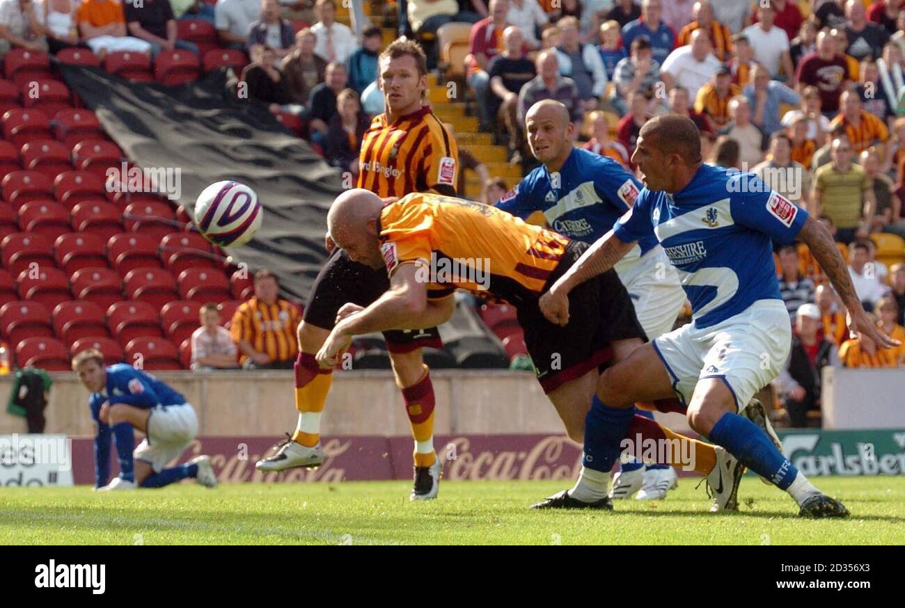 Bradford's Barry Conlon (centre) makes an attempt on goal during the ...