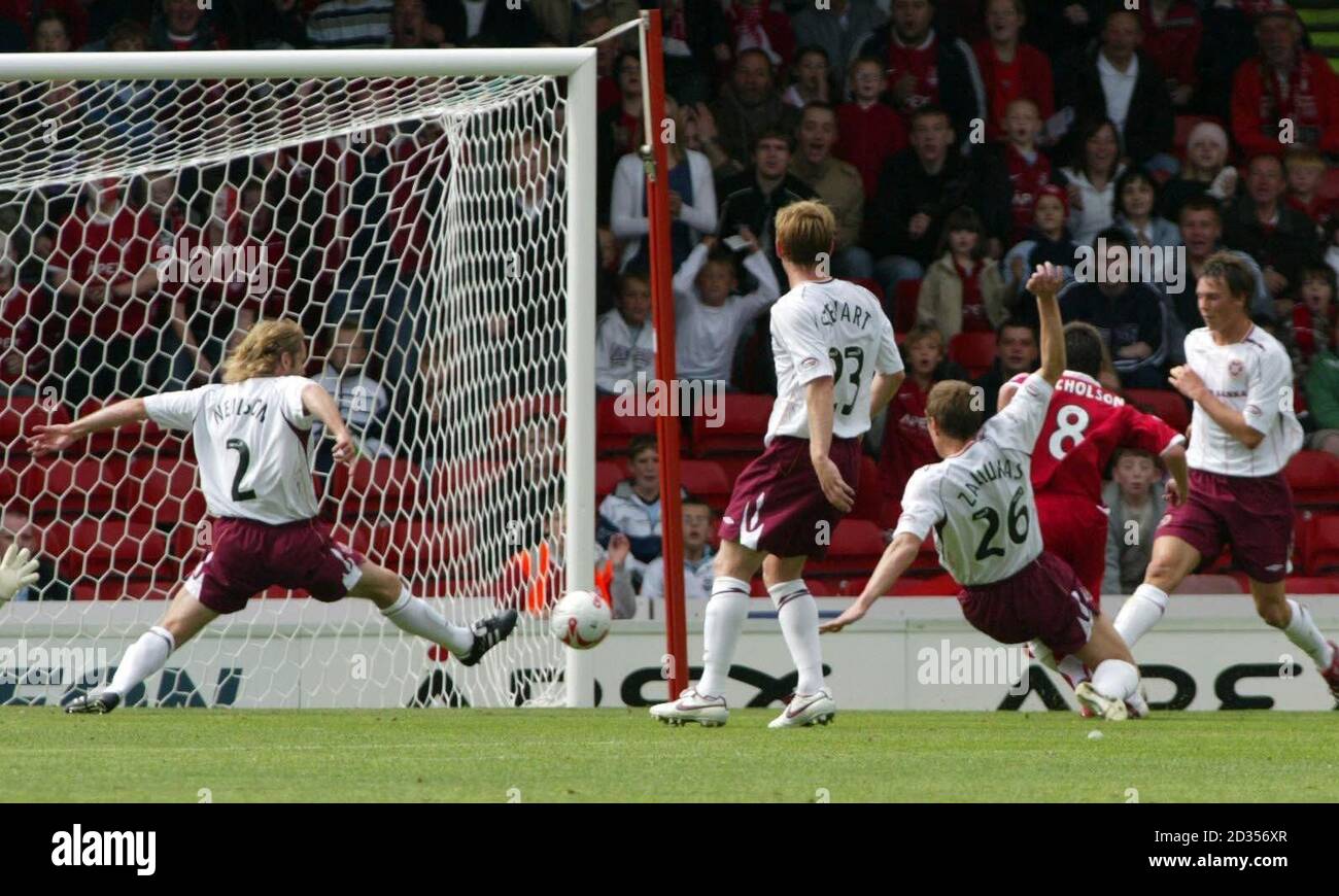 Aberdeen's Barry Nicholson scores against Hearts during the Clydesdale ...