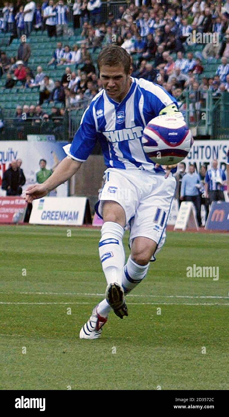 Brighton's Dean Hammond opens the scoring from the penalty spot during ...