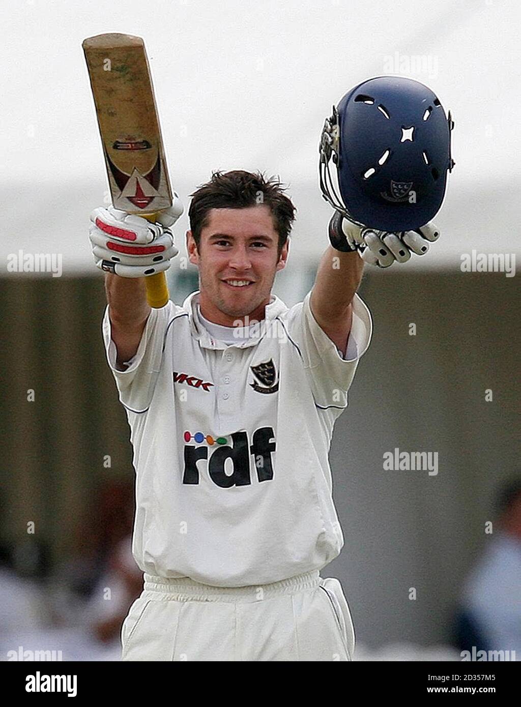 Cricket batsman raising bat hi-res stock photography and images - Alamy