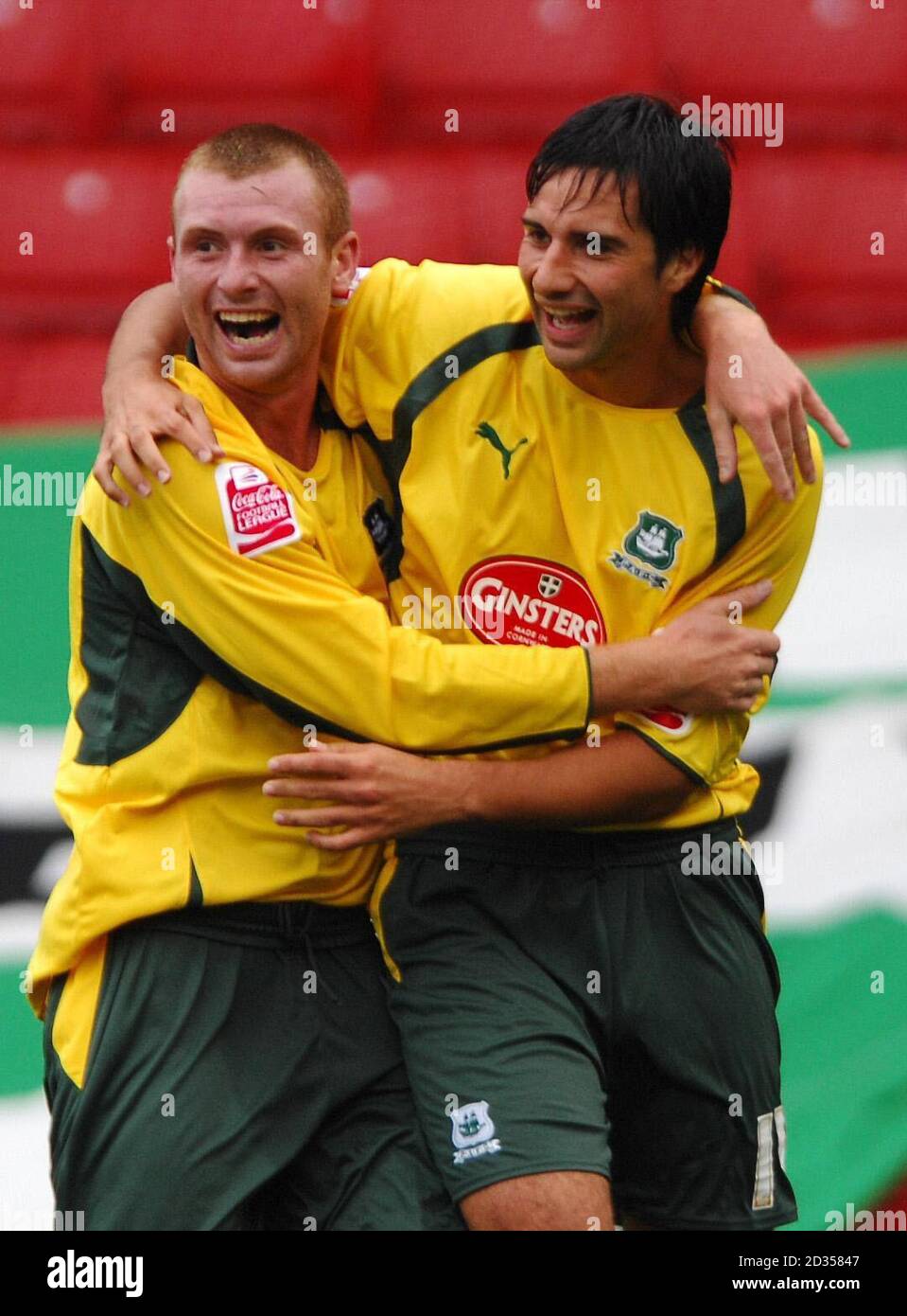 Plymouth Argyle's Rory Fallon (right) celebrates scoring their second ...