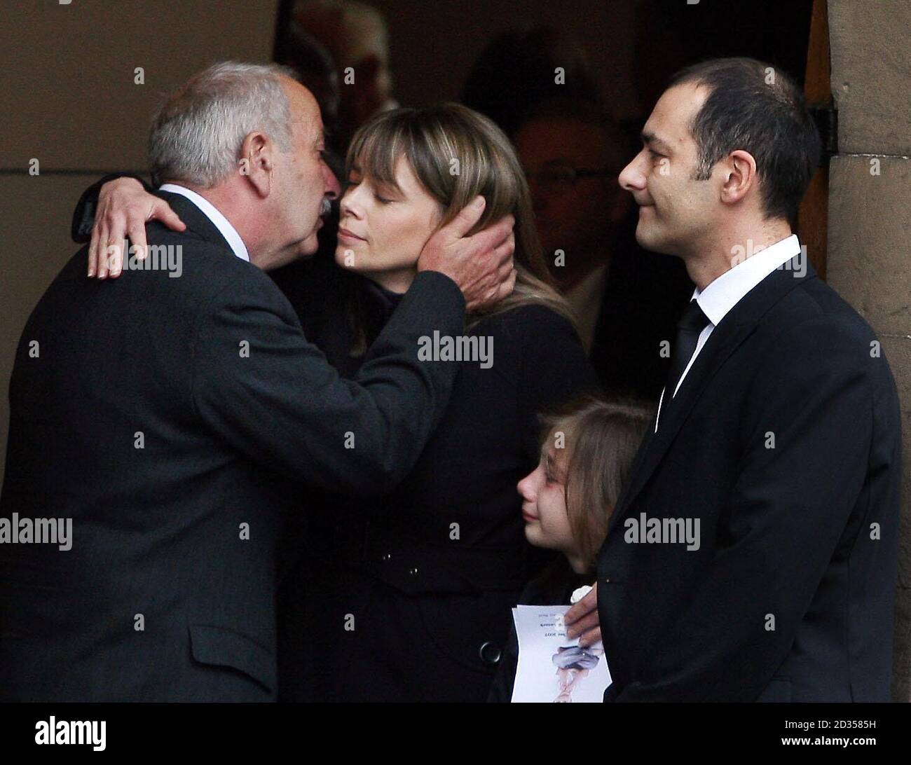 Karen (left) and Mark Porcelli (right) with daughter Carly depart the ...