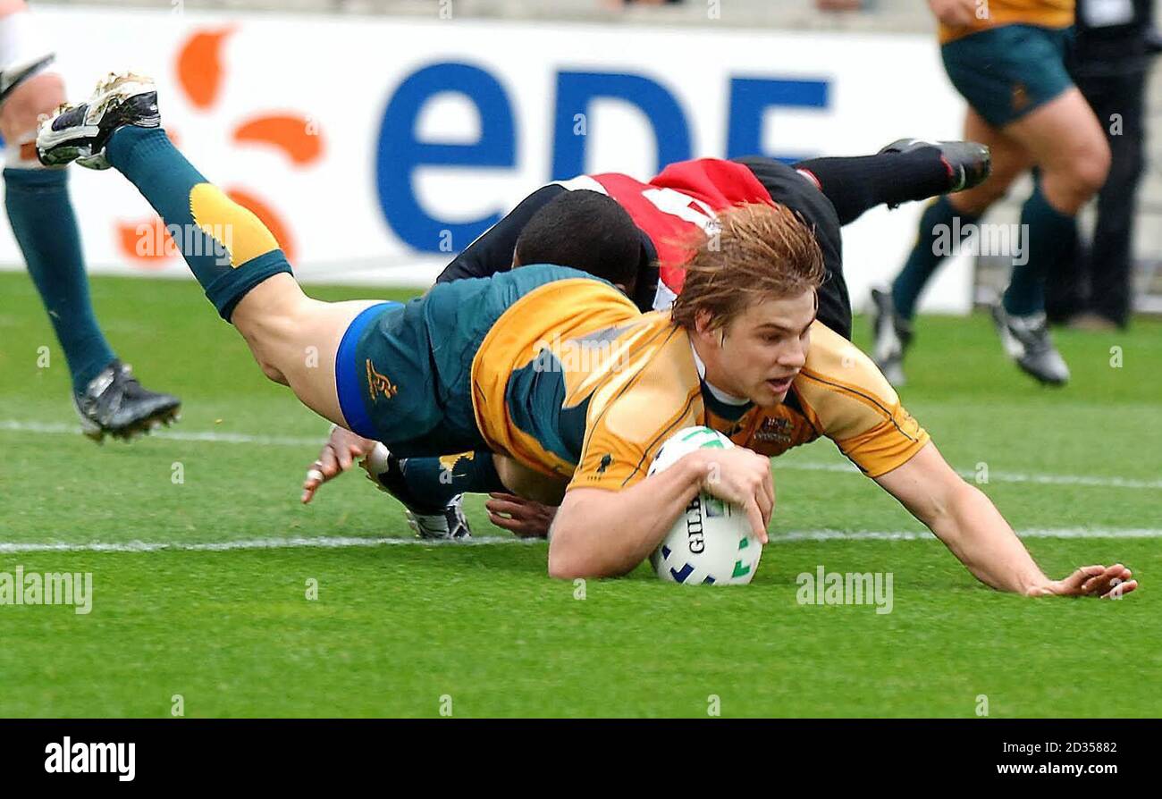 Australia's Drew Mitchell goes over for a try during the IRB Rugby ...
