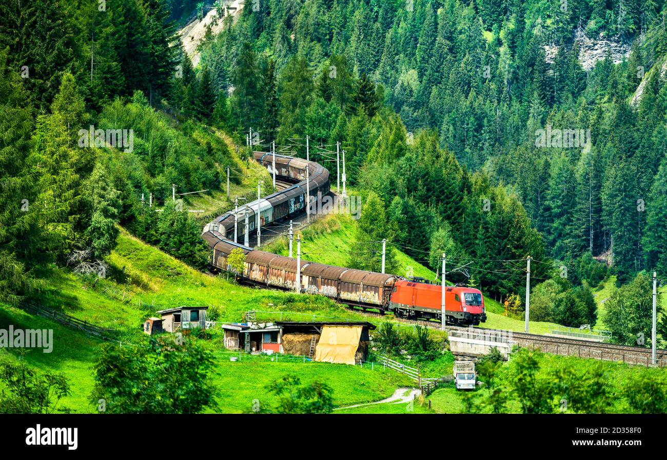 Freight train at the Brenner Railway in Austria Stock Photo - Alamy