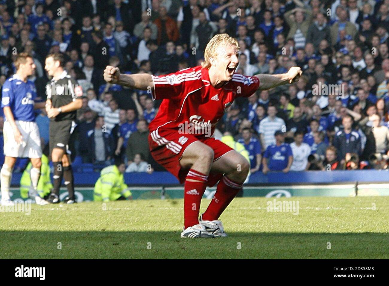 Liverpool's Dirk Kuyt celebrates after scoring from the penalty spot ...
