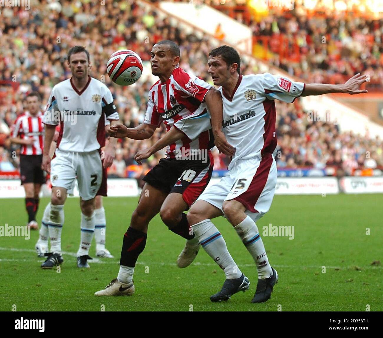 Full length action tackling challenge ball mangrk hi-res stock ...