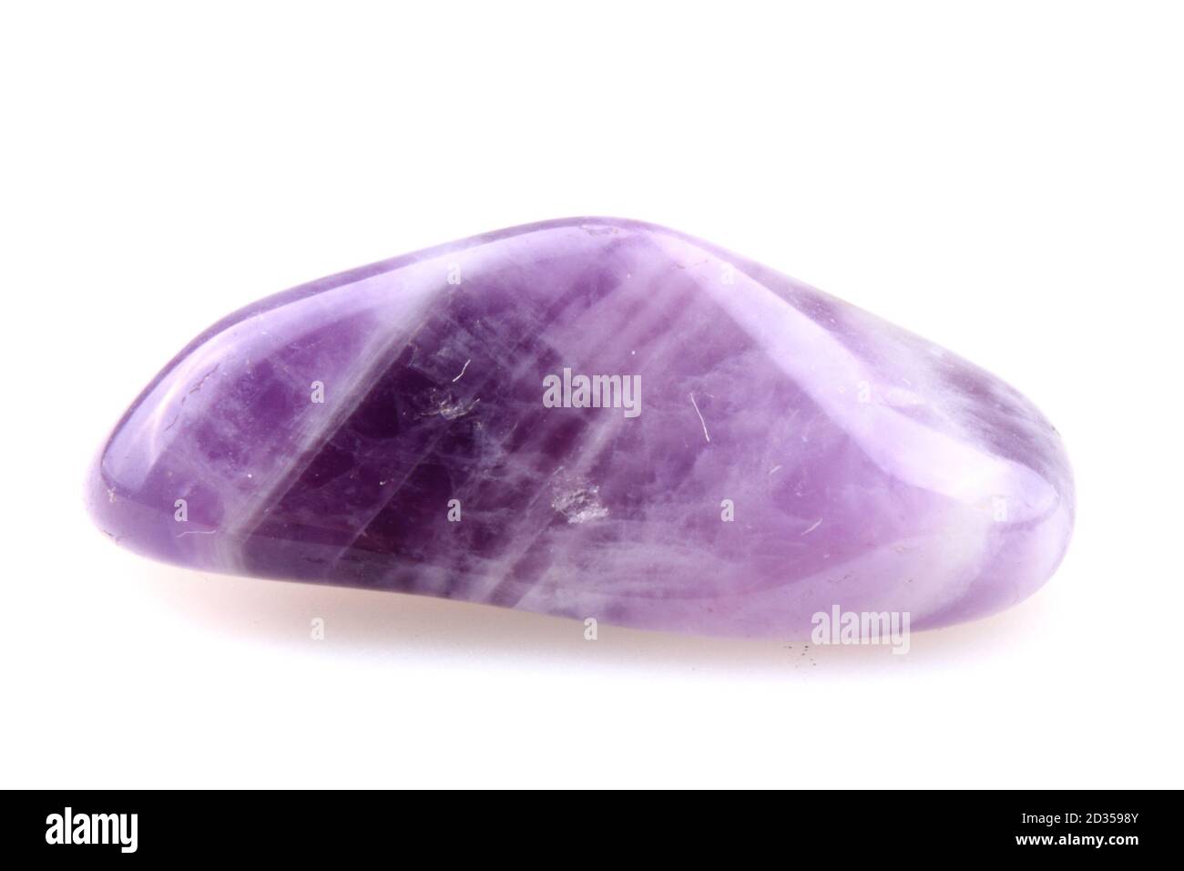 small violet amethyst isolated on the white background Stock Photo - Alamy