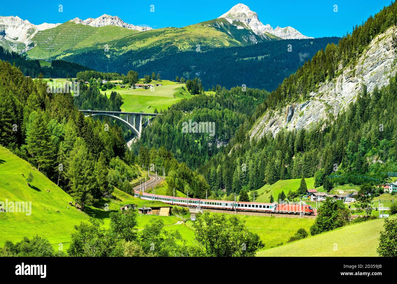 Passenger train at the Brenner Railway in Austria Stock Photo - Alamy