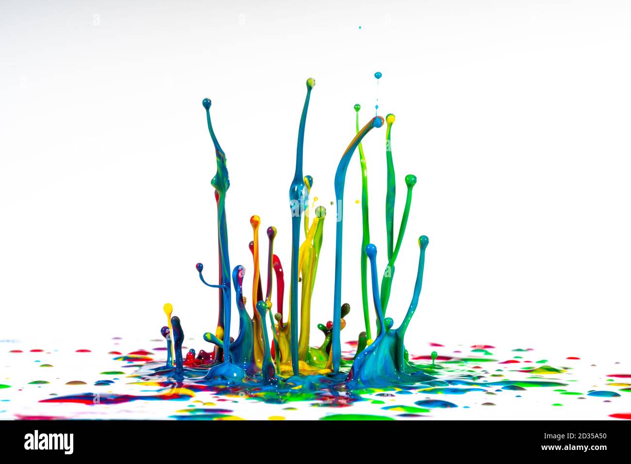 Splash of color ink or paint on white background Stock Photo - Alamy