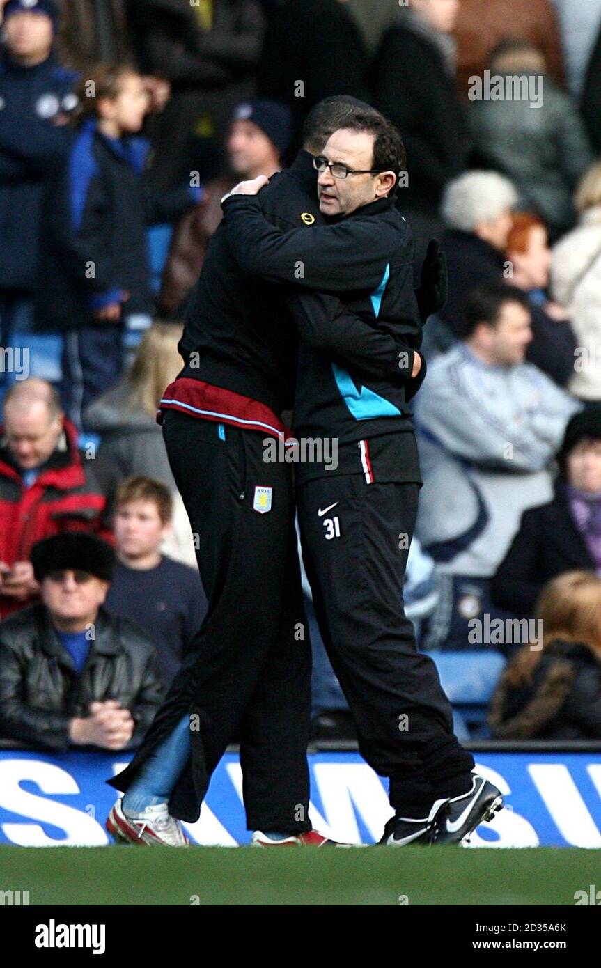 Aston Villa's John Carew hugs manager Martin O'Neill at the final ...