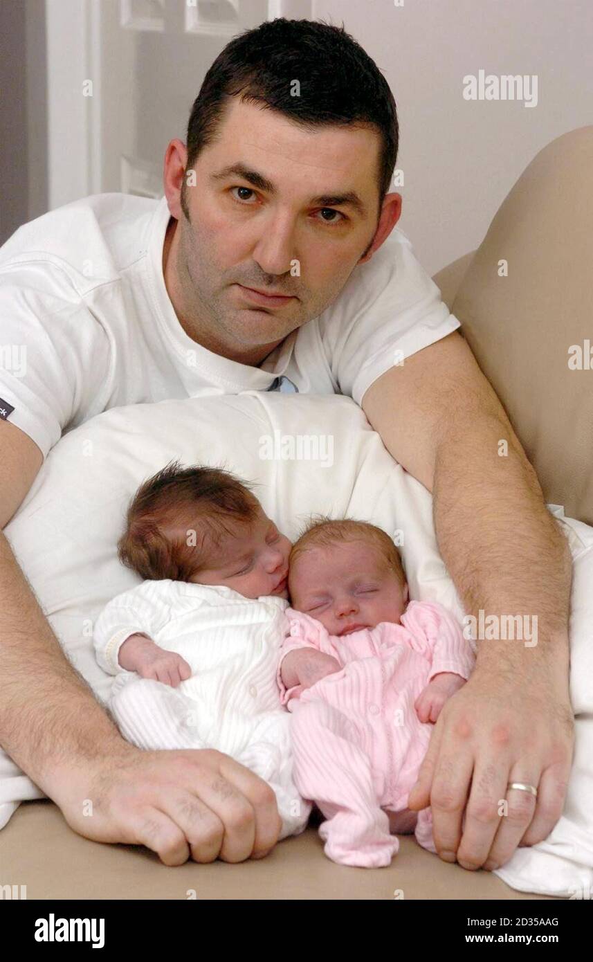 Ryan Finkill, 38, with his twin girl daughters Isabelle (left) and ...