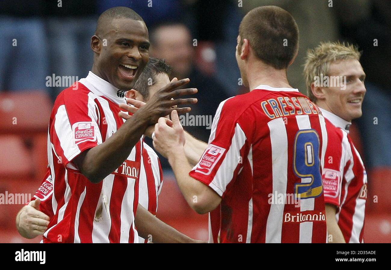 Stoke City's Leon Cort, left, celebrates scoring against Preston during ...