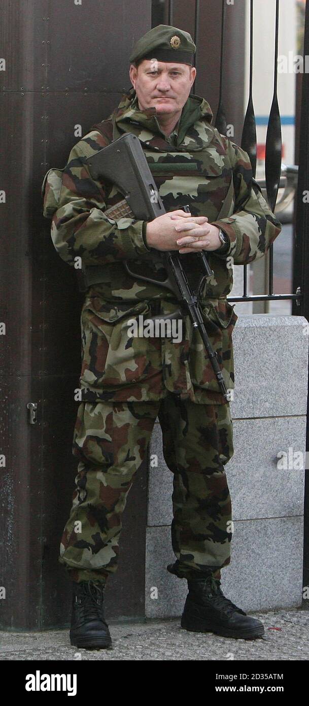A member of the Irish Defence force stand guard as Real IRA Leader ...