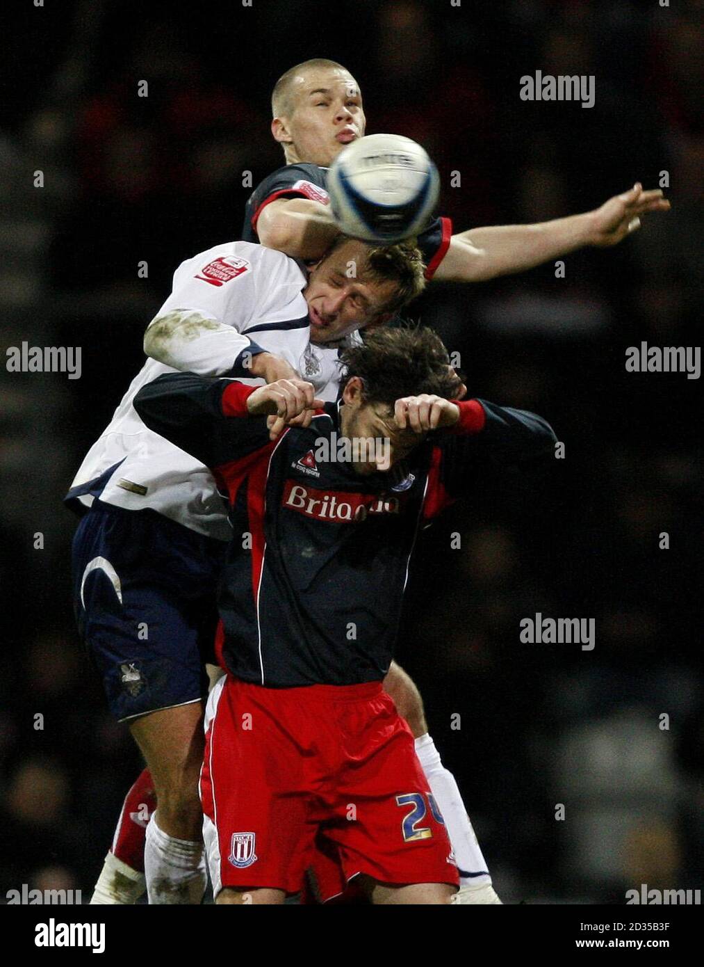 Preston's Chris Brown (centre) and Stoke's Ryan Shawcross (top) and ...