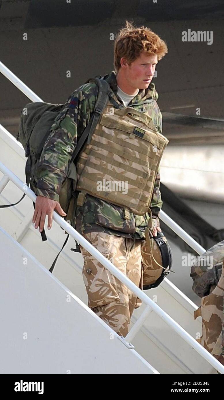 Prince Harry stepping of a plane at RAF Brize Norton in Oxfordshire on ...