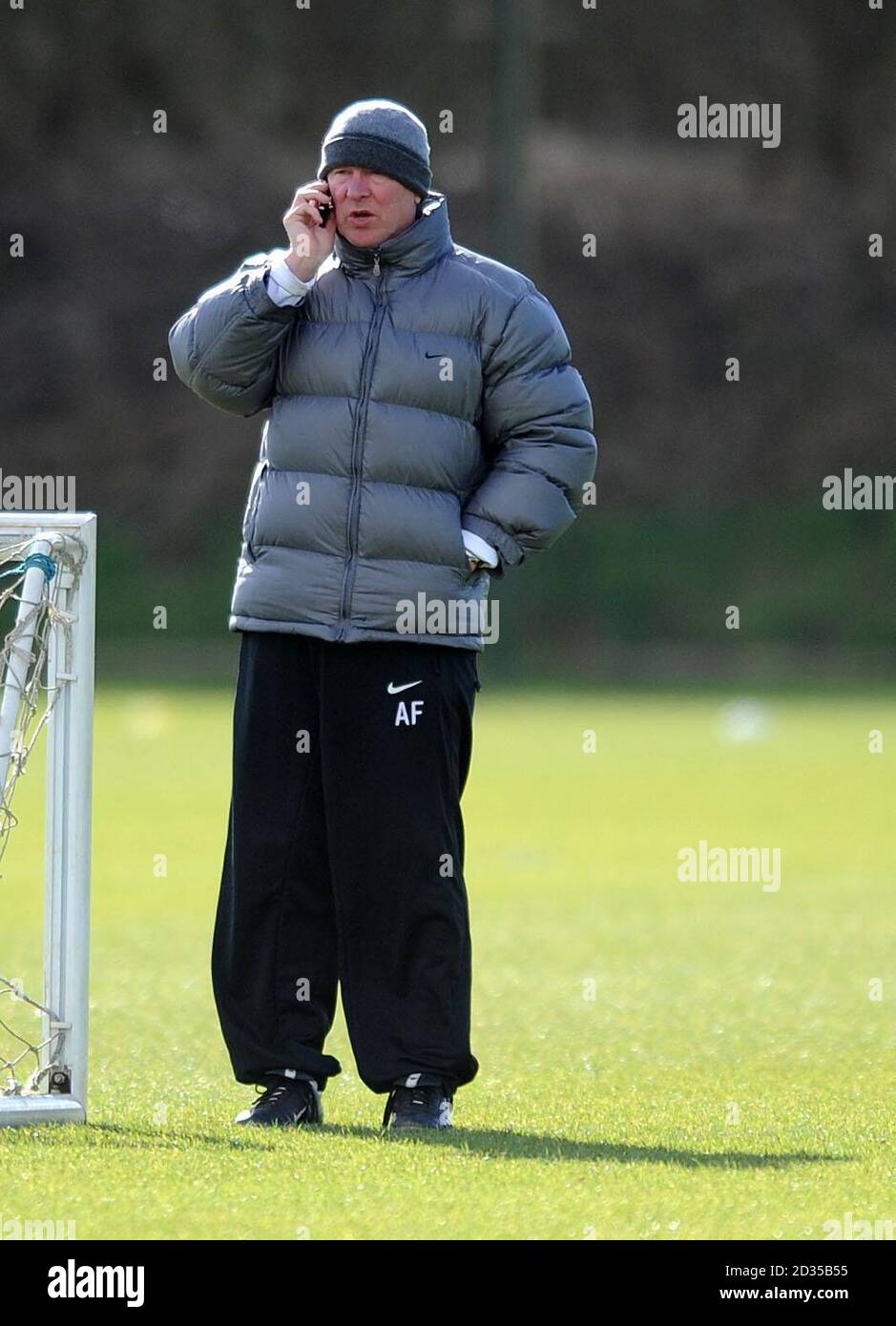 Sir alex ferguson during training session at carrington training ground ...