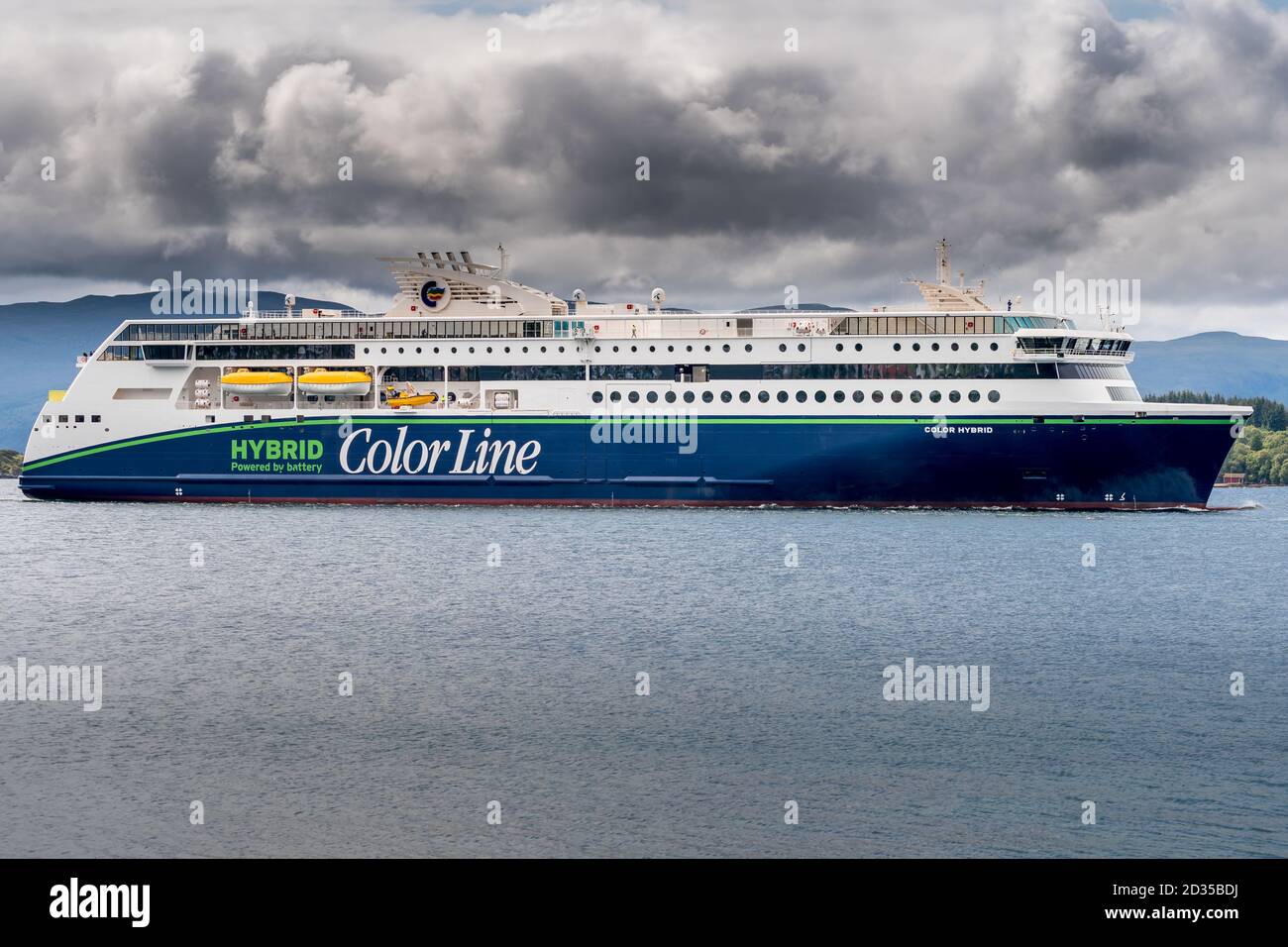 ULSTEINVIK, NORWAY - 2019 JULY. Color Hybrid vessel in the fjord of ...